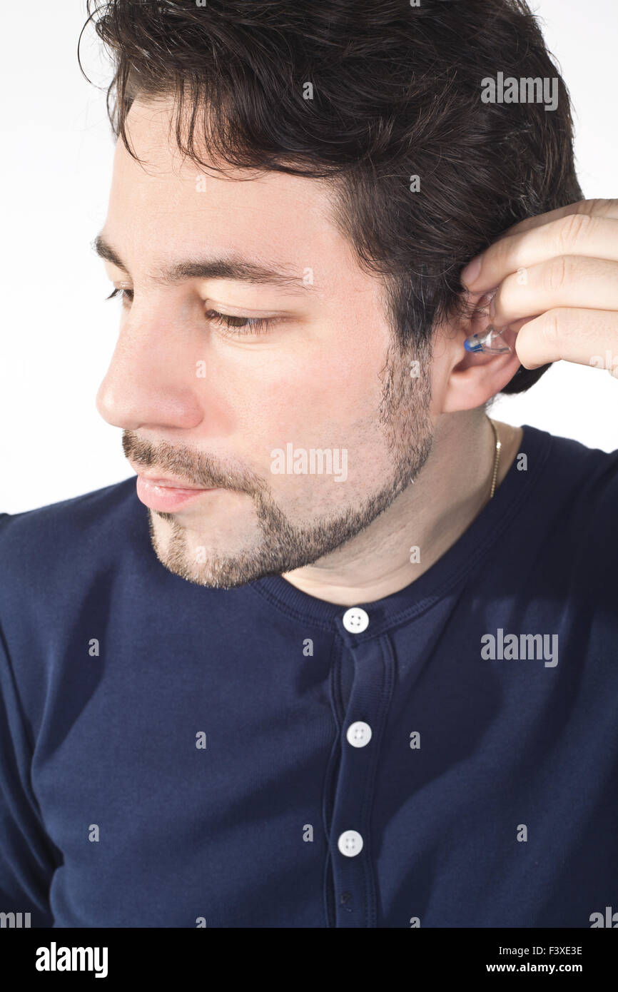 ear with acoustic instrument Stock Photo - Alamy