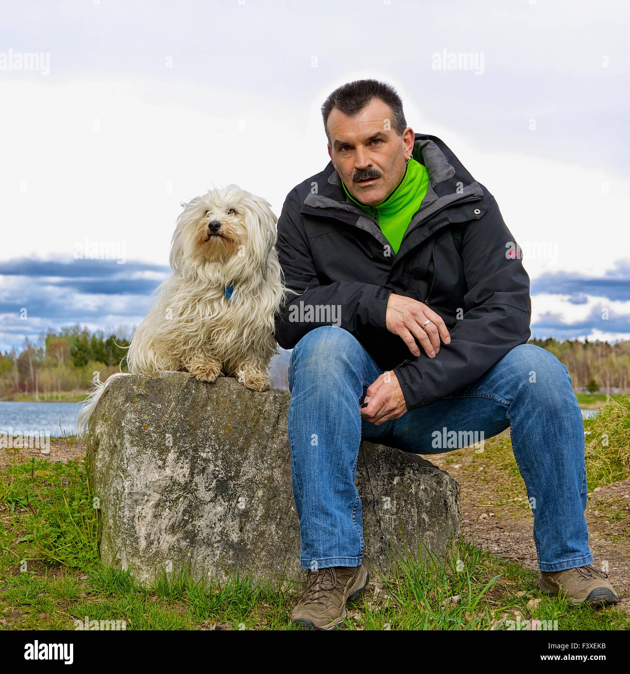 Dog and owner Stock Photo - Alamy