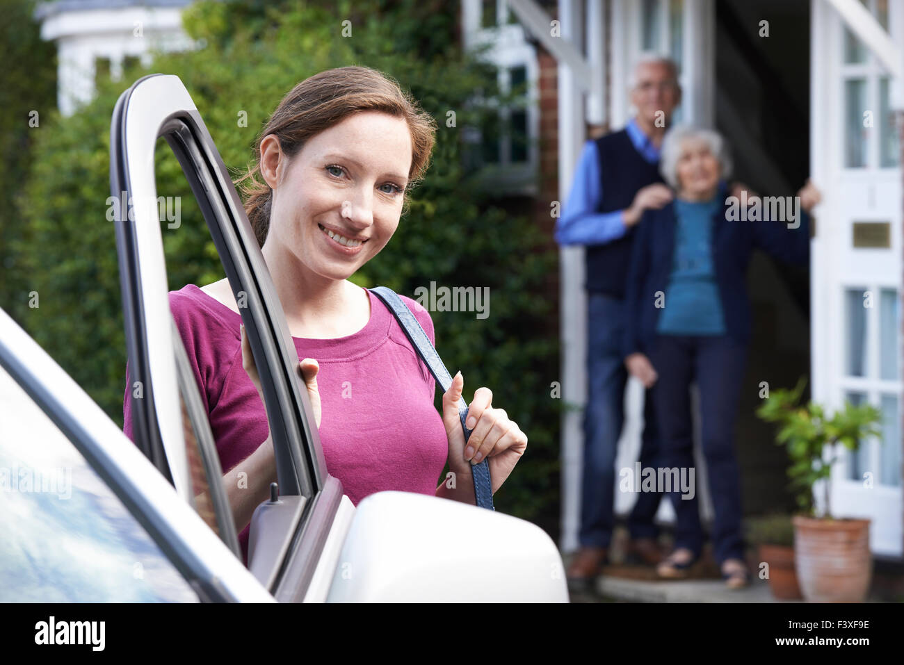 Adult Daughter Visiting Senior Parents At Home Stock Photo - Alamy