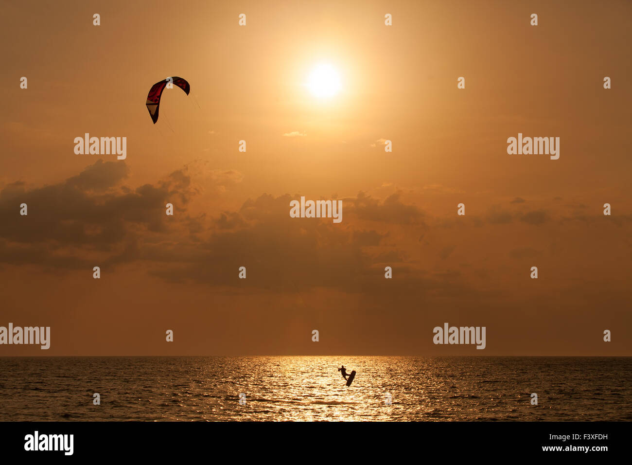 Kite surfer jumping from the water Stock Photo - Alamy