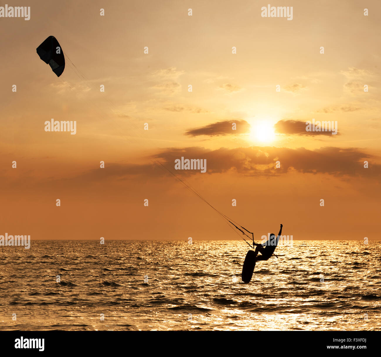 Kite surfer jumping from the water Stock Photo - Alamy