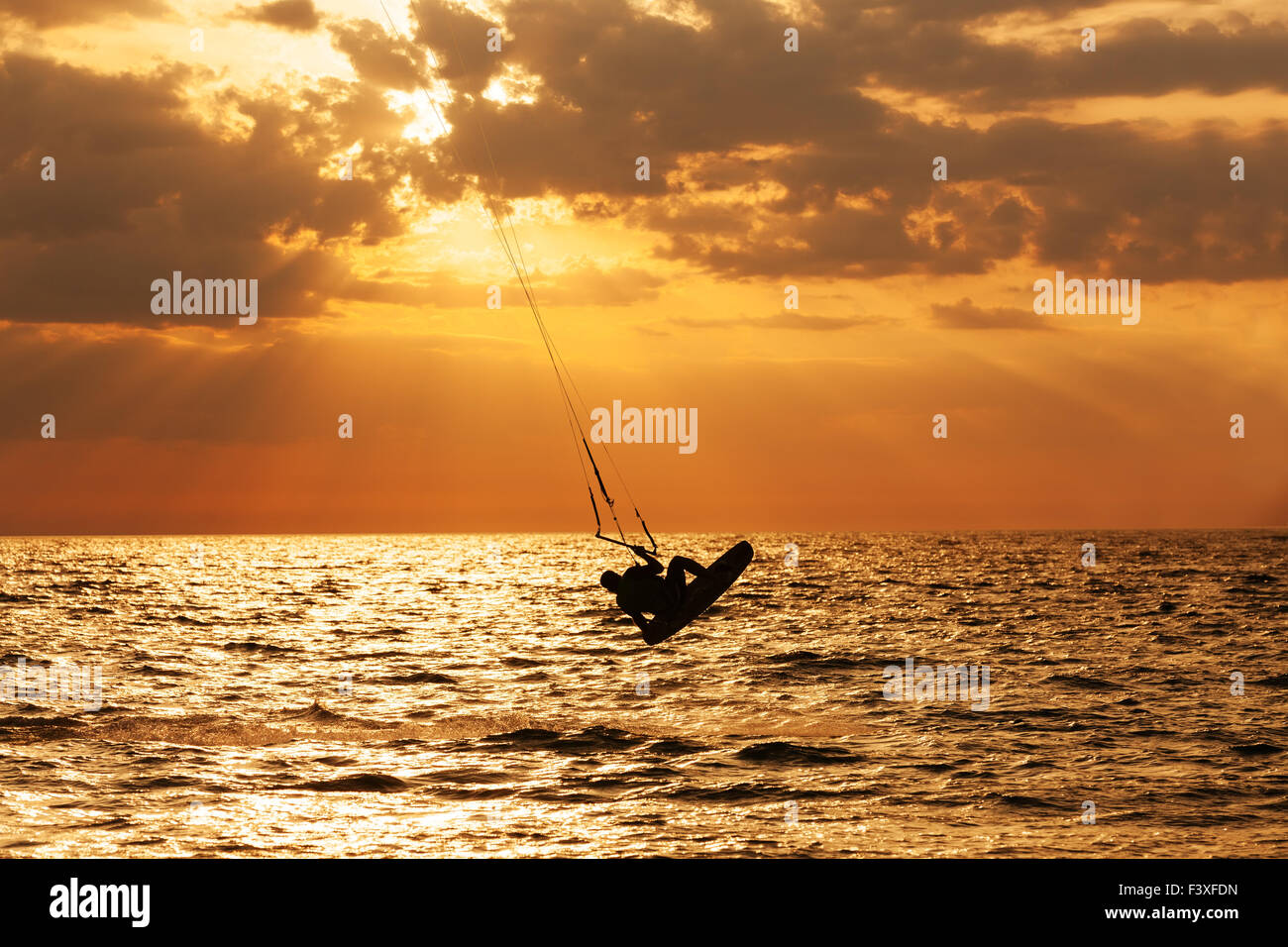 Kite surfer jumping from the water Stock Photo - Alamy