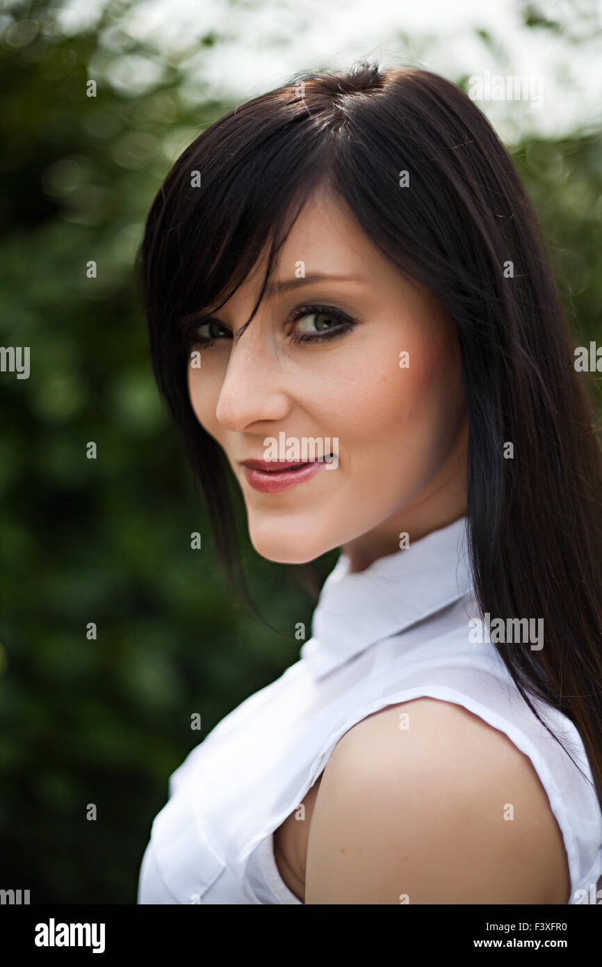 Portrait of a bautiful young woman outdoor Stock Photo - Alamy