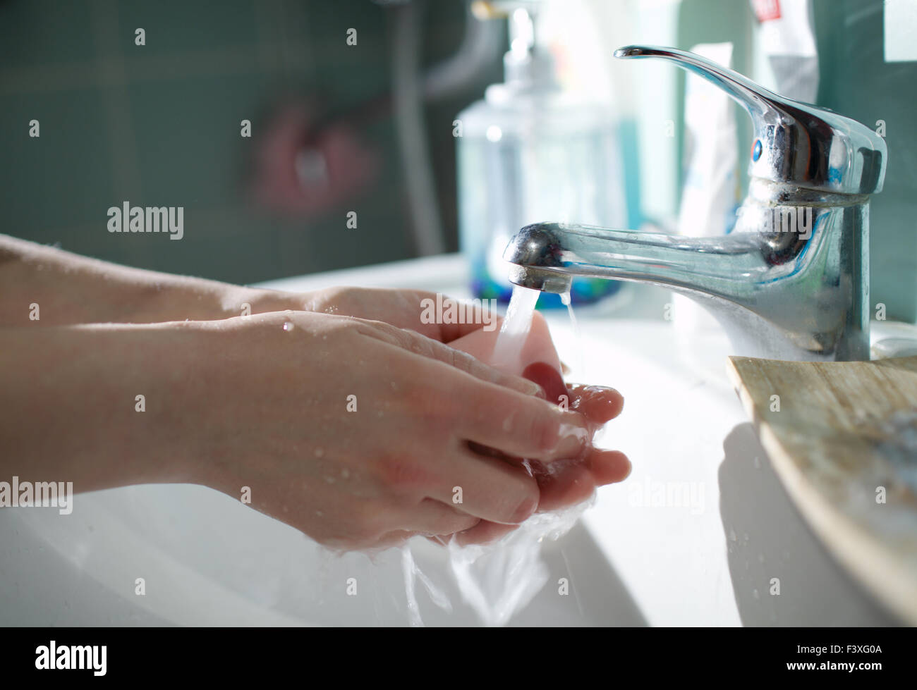 Woman washing hands soap closeup hi-res stock photography and images ...