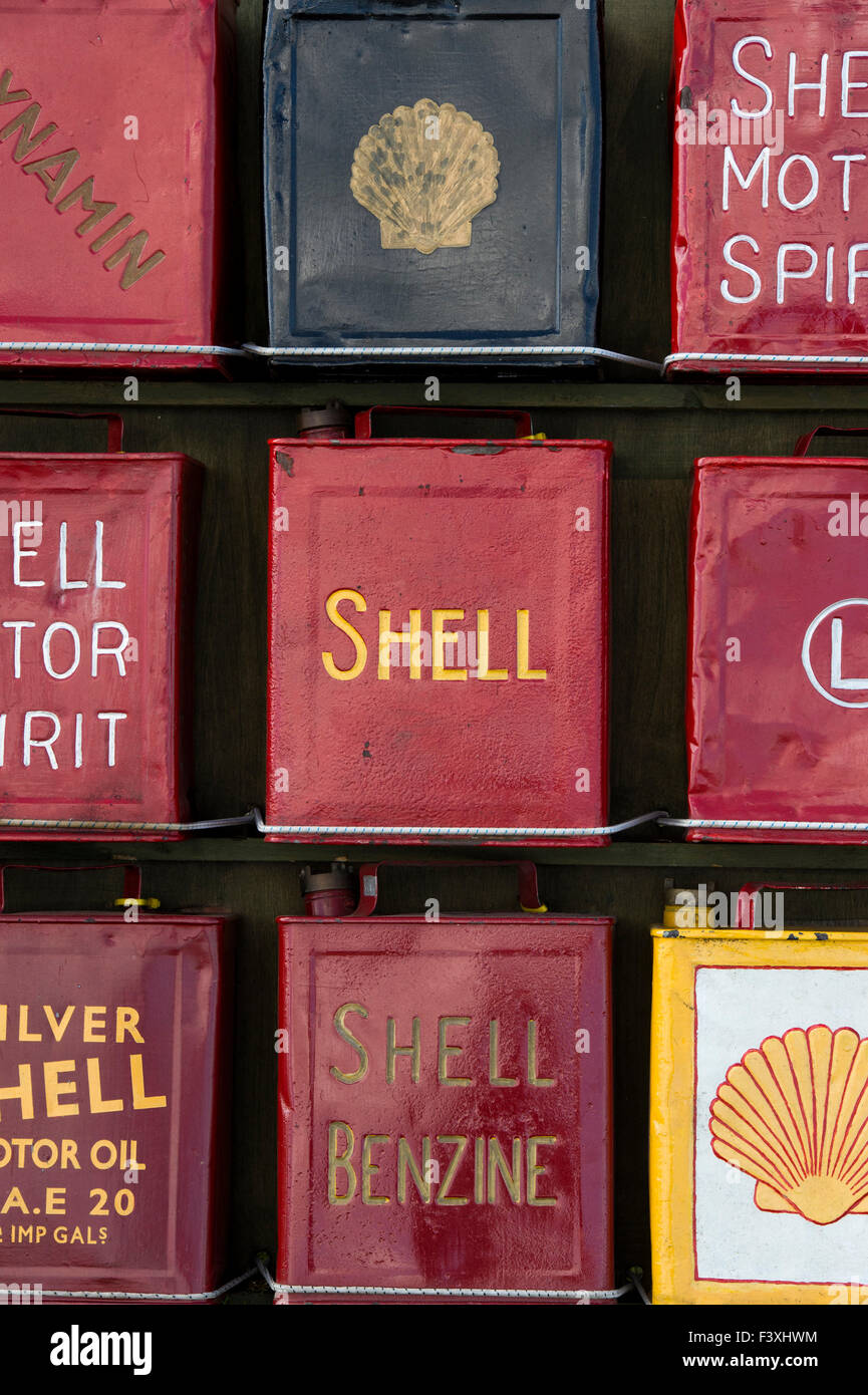 Old shell motor oil metal cans Stock Photo - Alamy