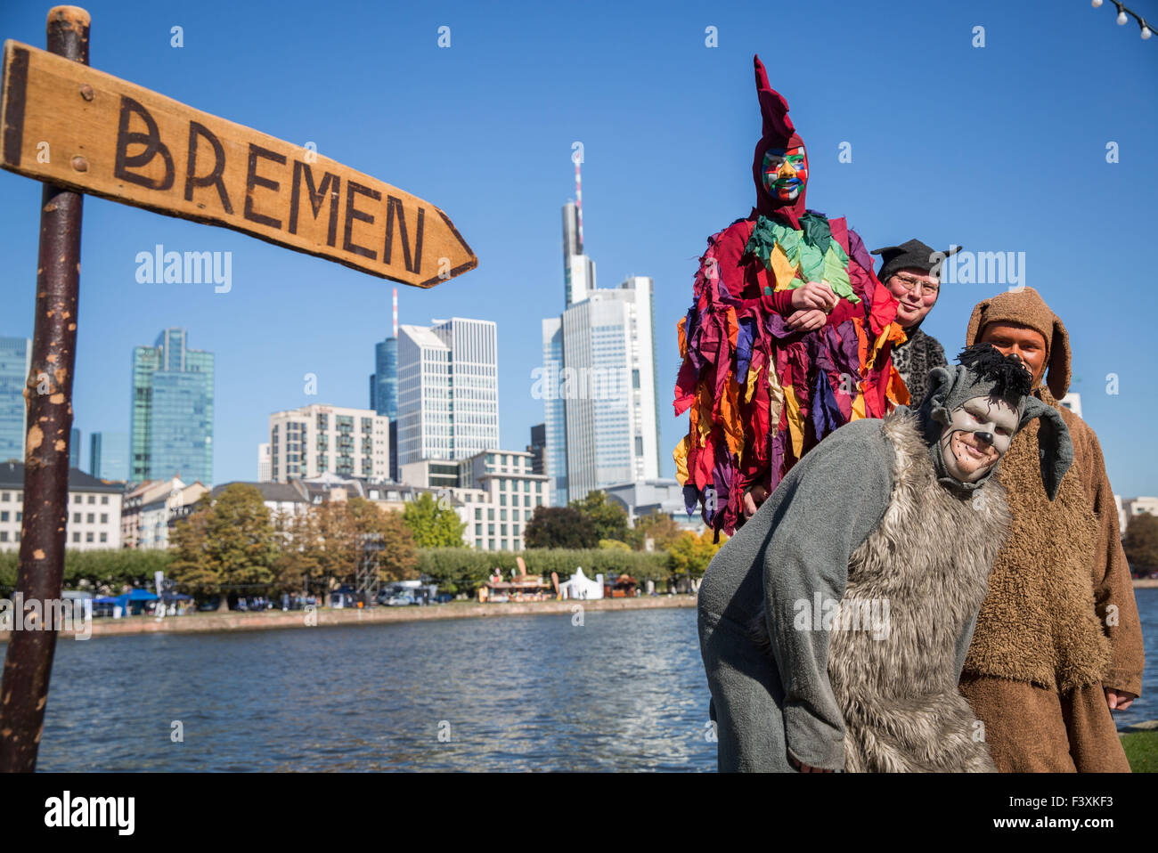 Actors dressed as the Bremen Town Musicians pose in front of the ...