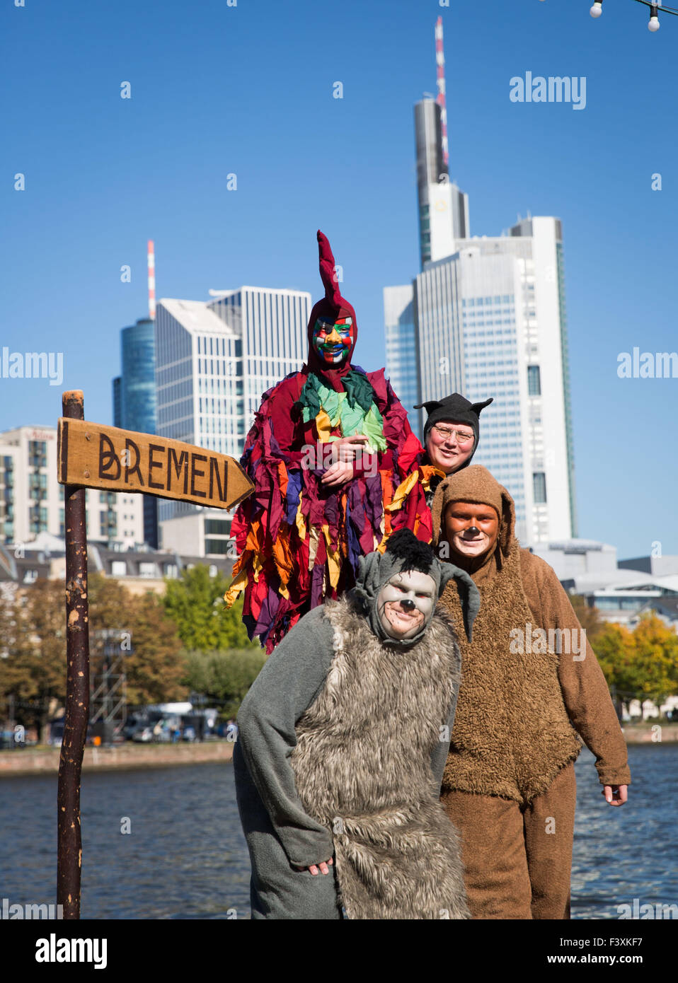 Actors dressed as the Bremen Town Musicians pose in front of the ...