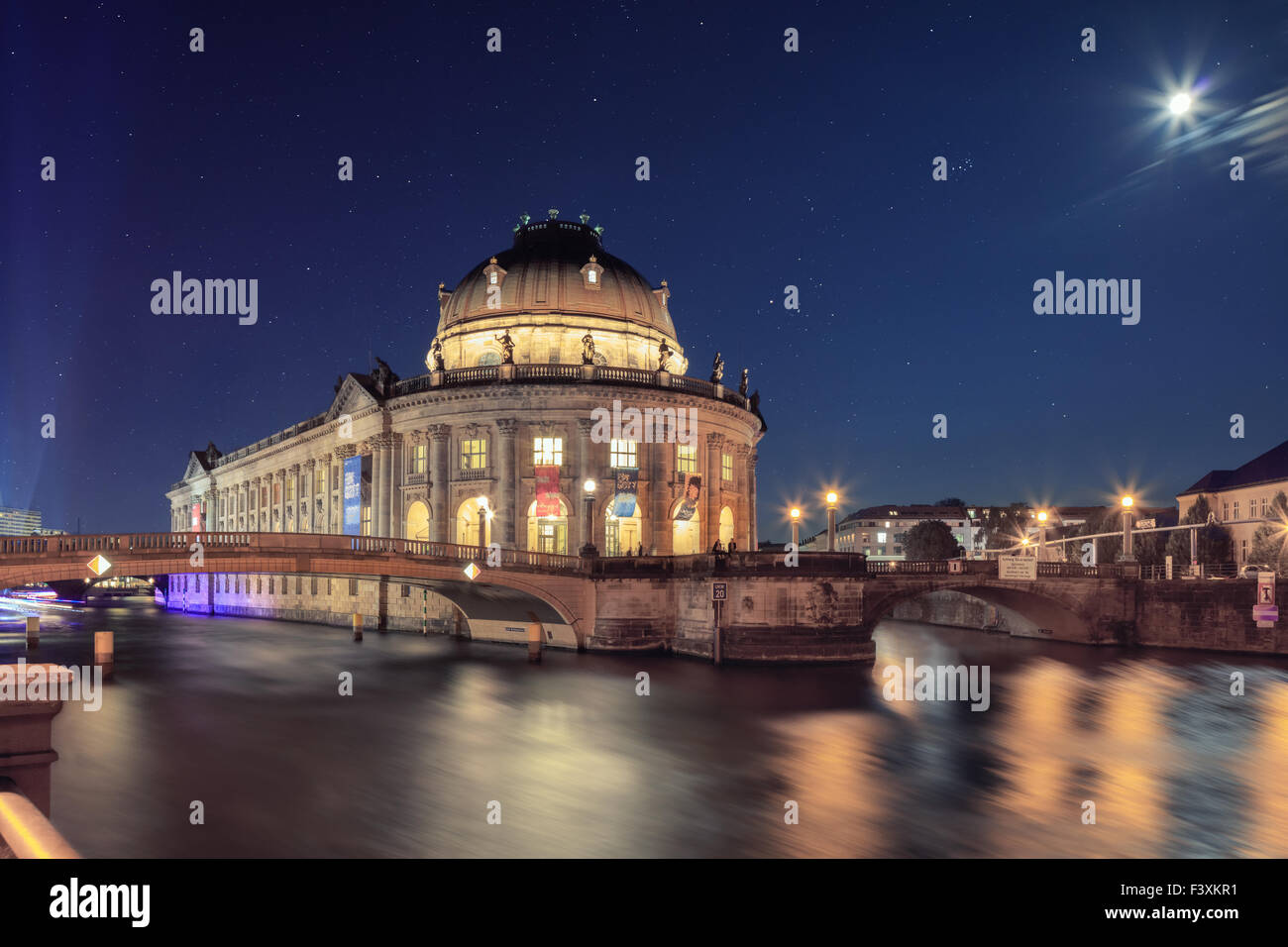The Bode Museum at night with moon shining bright and reflections in ...