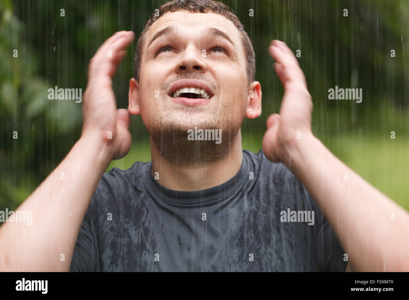 With young at rain hi-res stock photography and images - Alamy