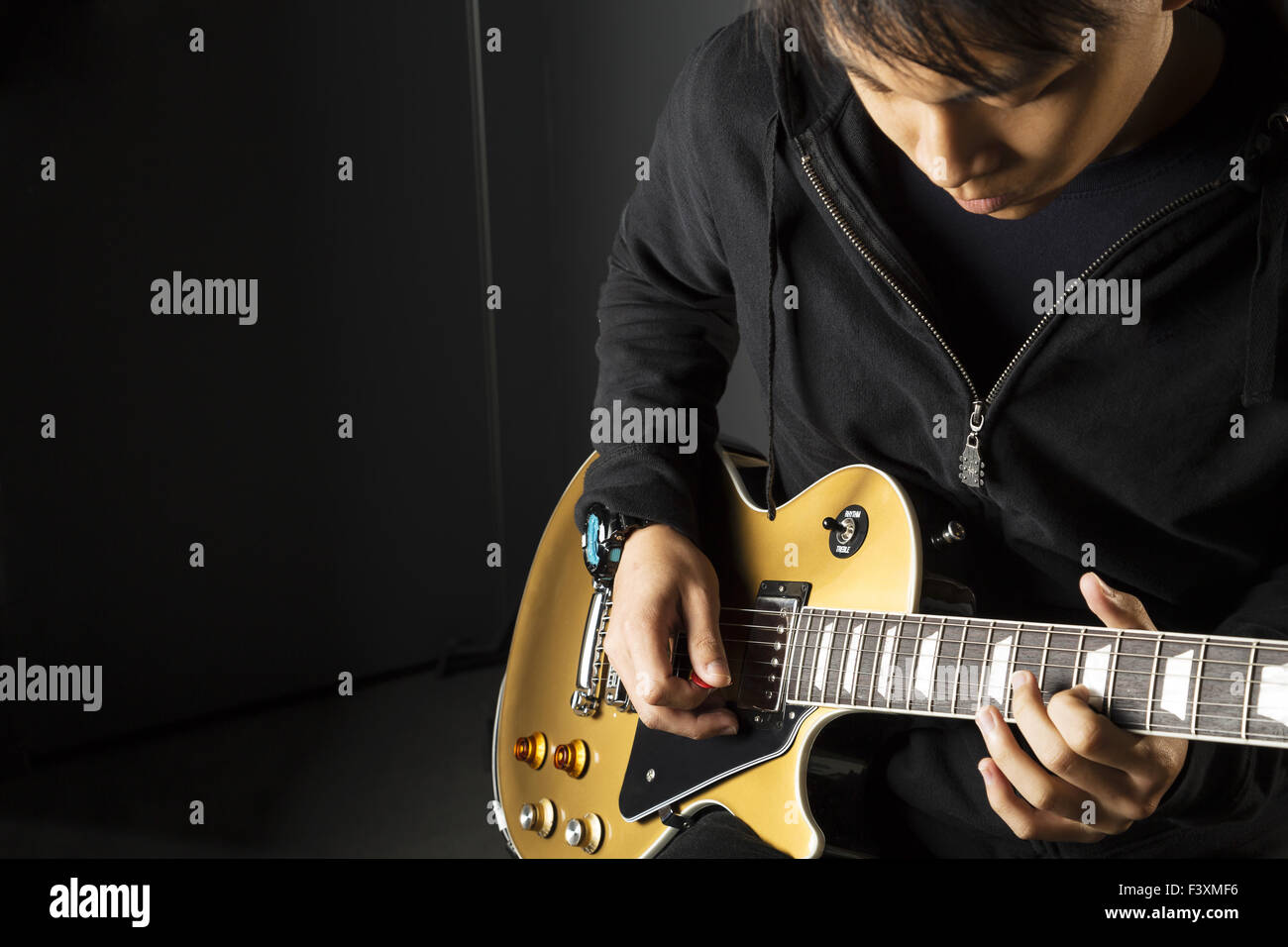 Asian guitarist hi-res stock photography and images - Alamy