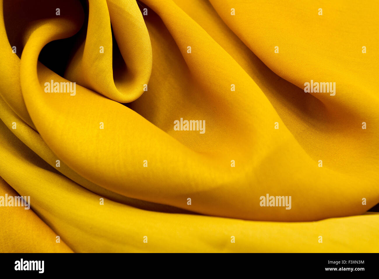 Golden textile background hi-res stock photography and images - Alamy