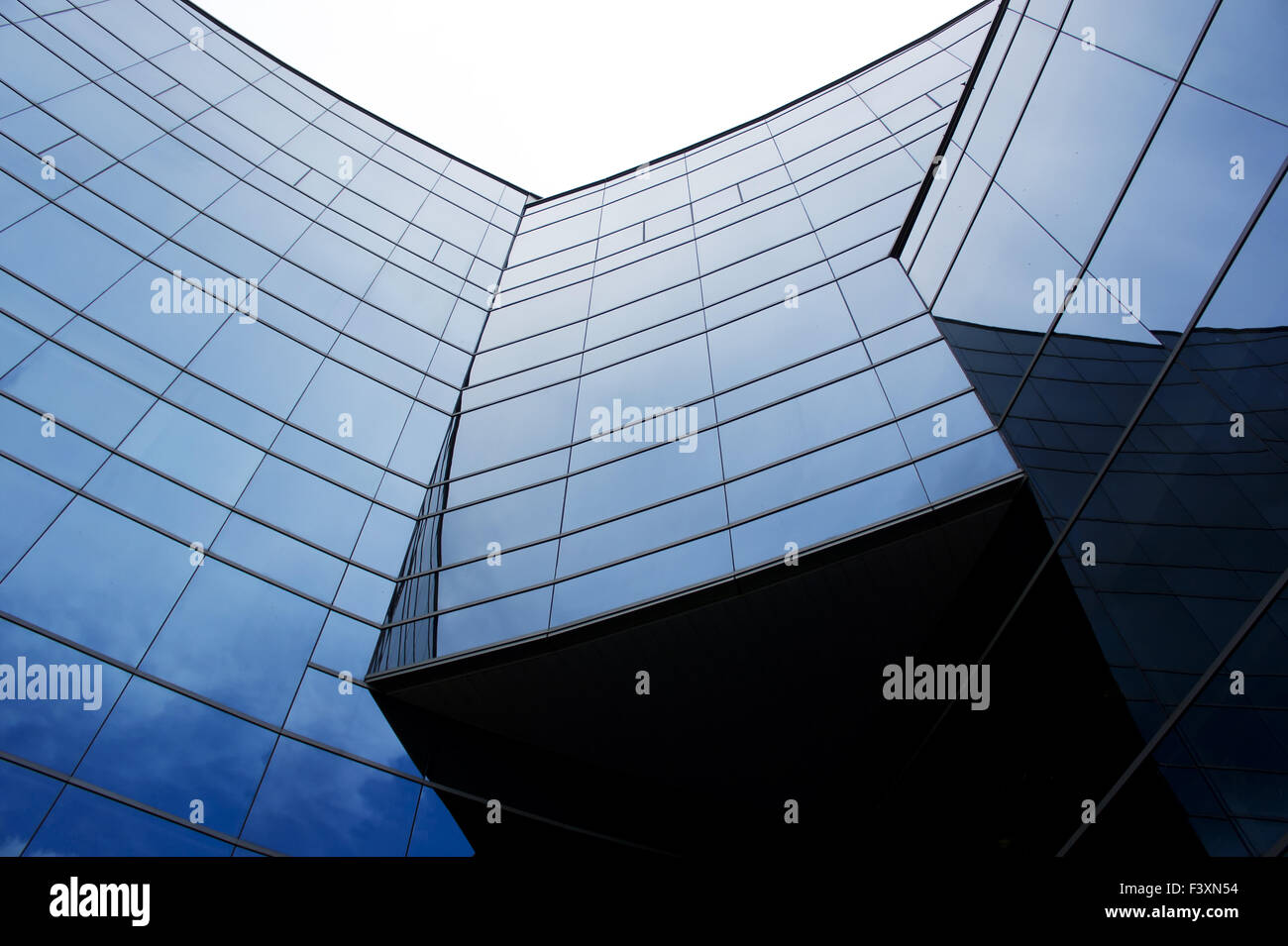 Three curve arc glass walls Stock Photo - Alamy