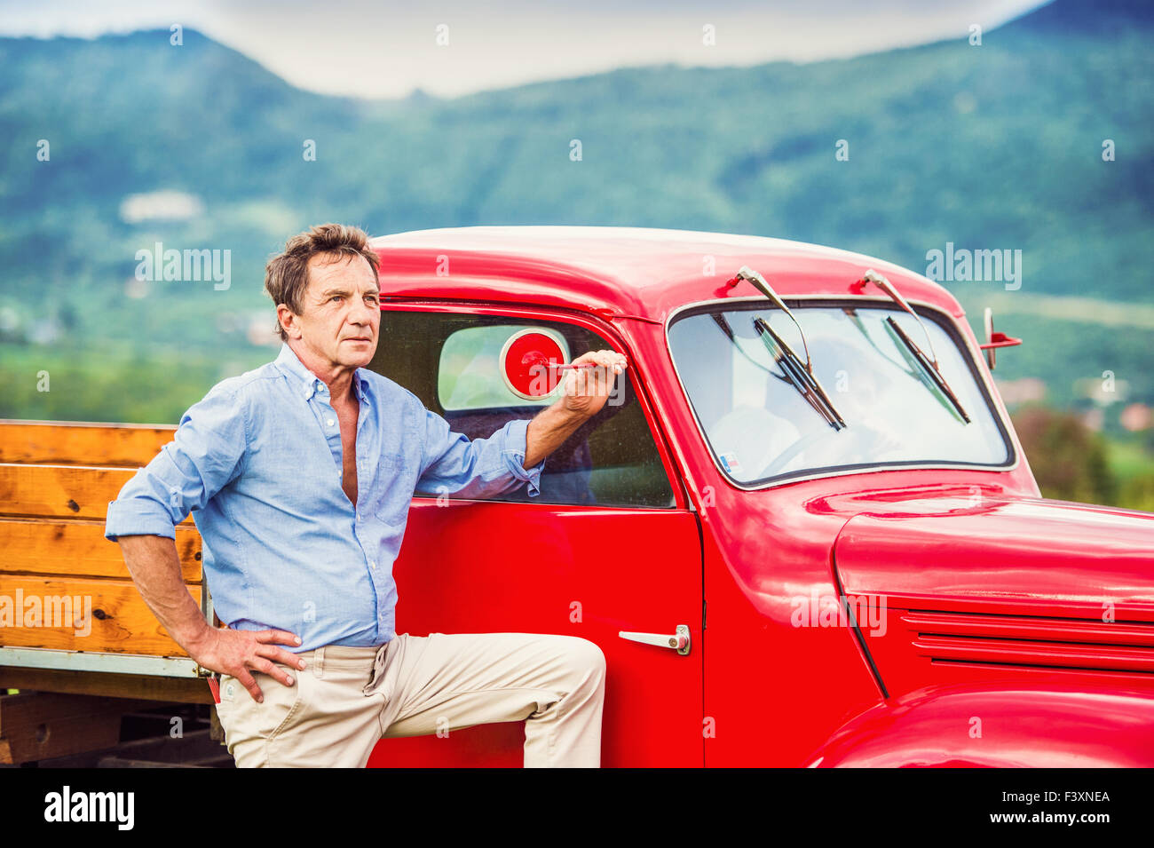 Red man truck driving hi-res stock photography and images - Alamy