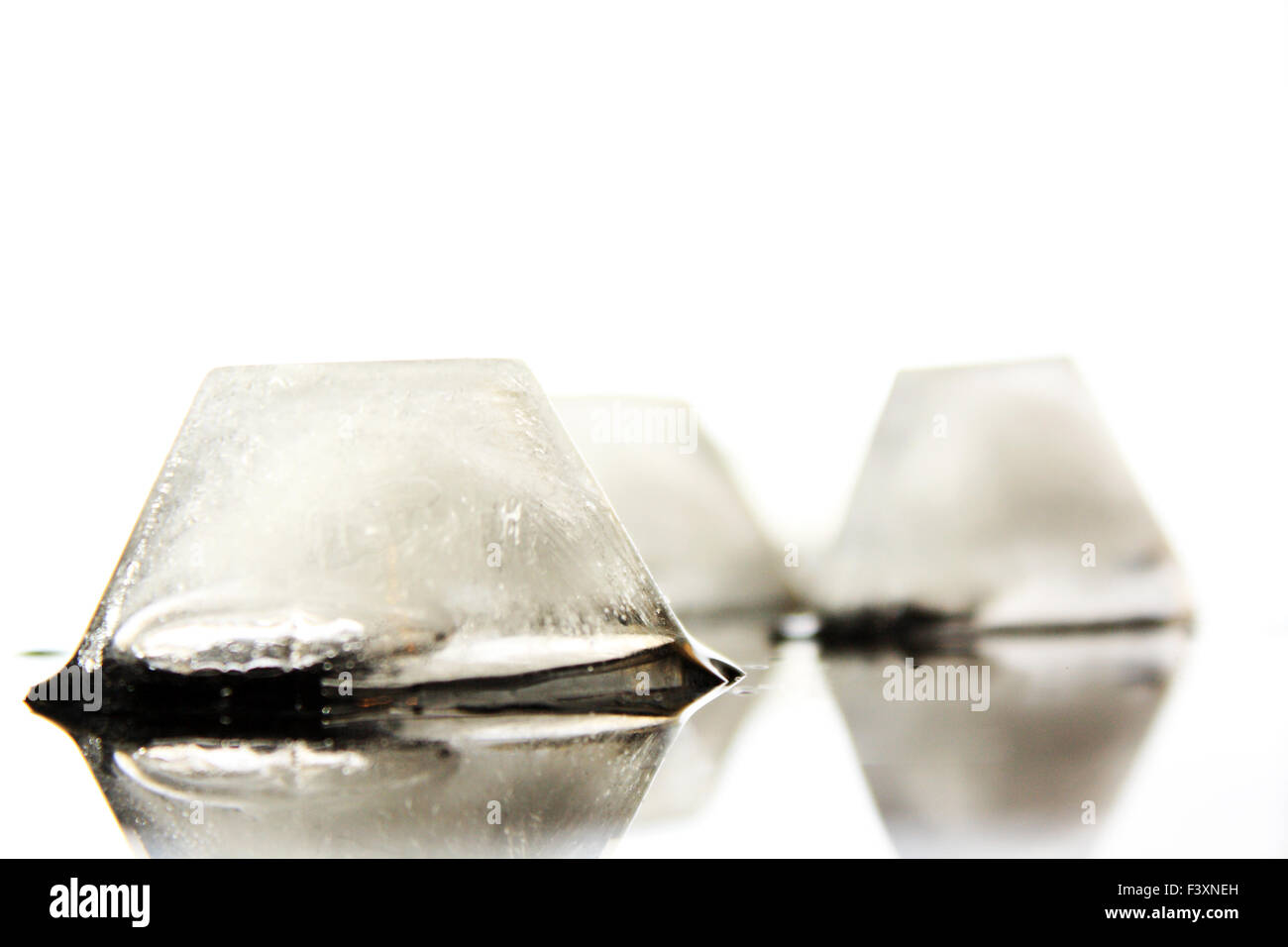 several ice cubes in the form of ground Stock Photo - Alamy