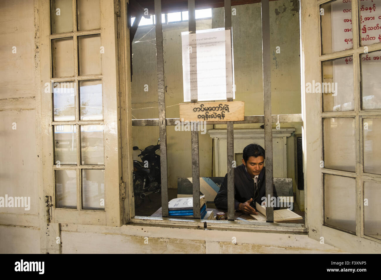 Ticket window at railway station, Shwenyaung Stock Photo - Alamy