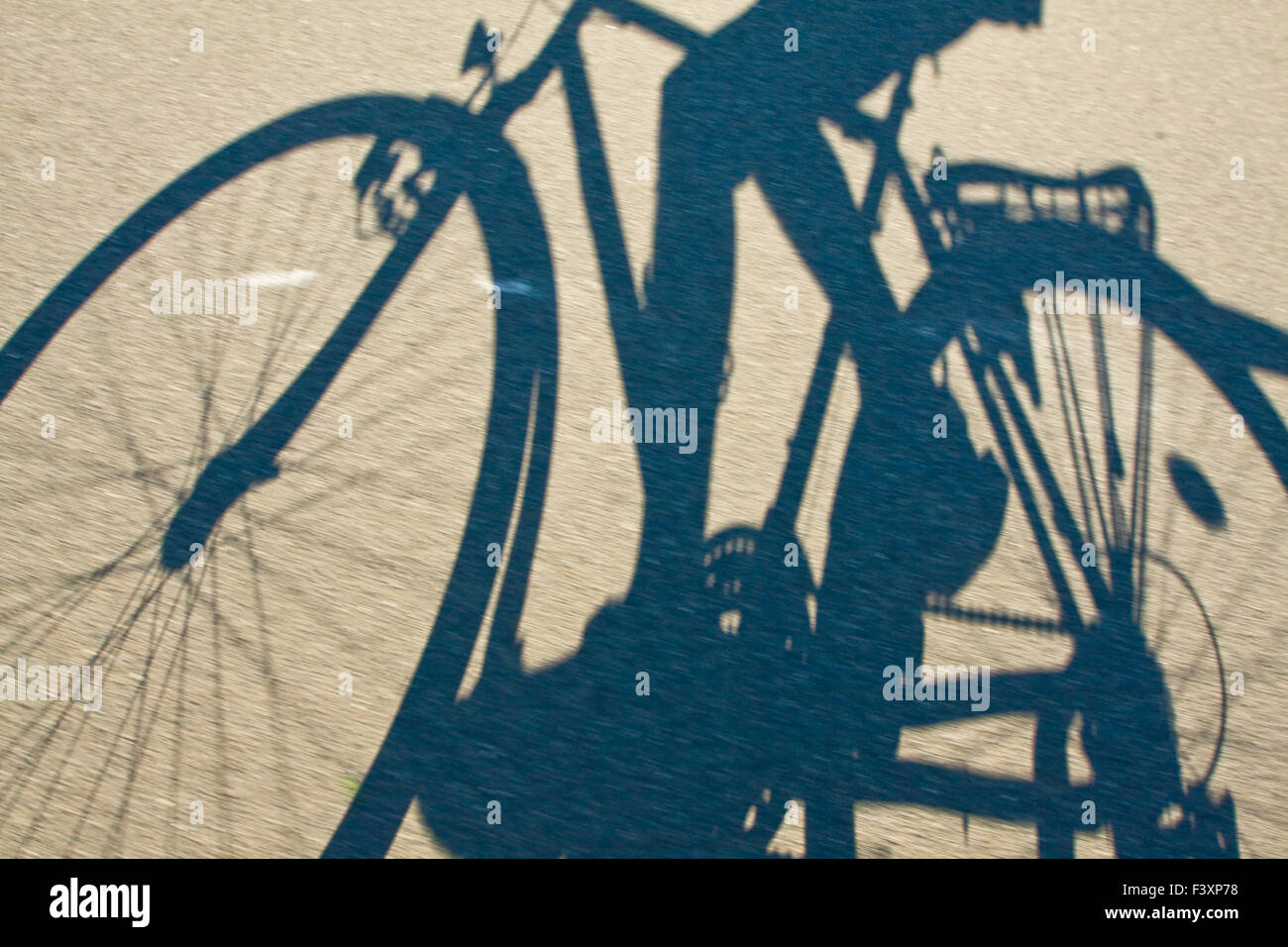 Bike shadow hi-res stock photography and images - Alamy