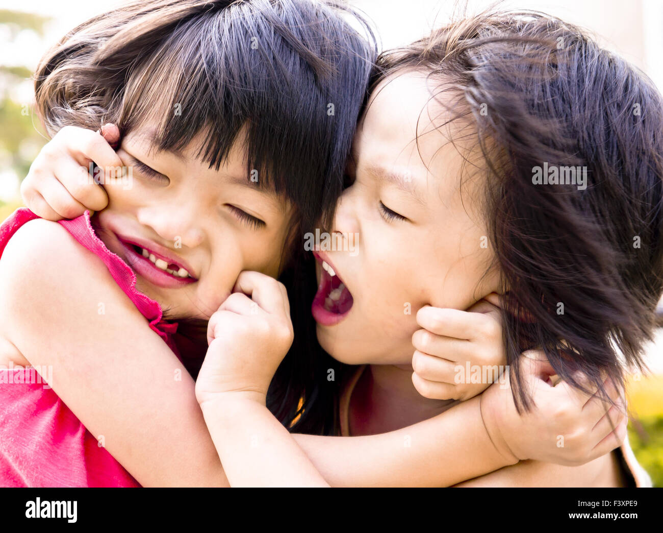 Brother and sister wrestling hi-res stock photography and images - Alamy