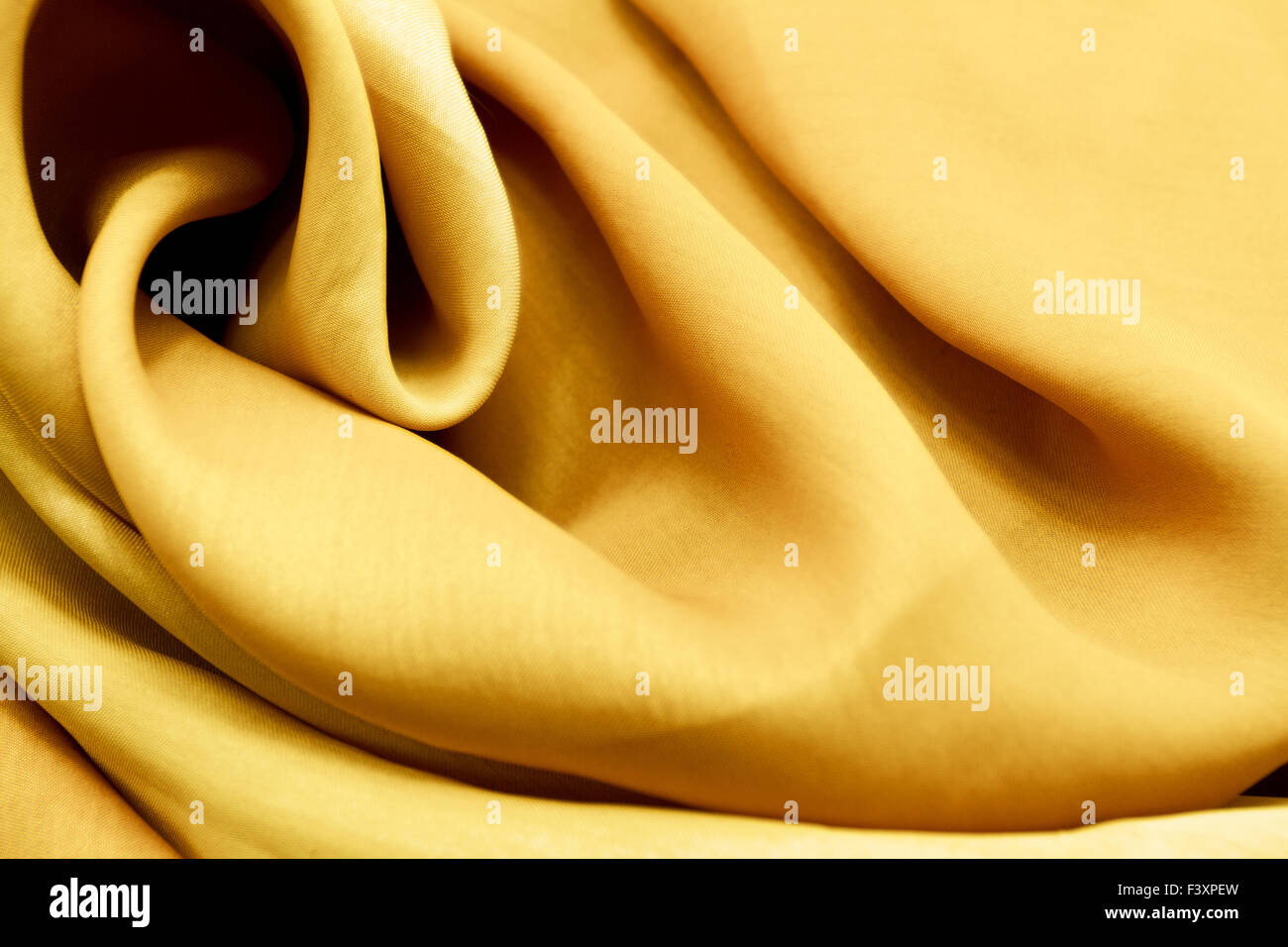 Golden textile background hi-res stock photography and images - Alamy