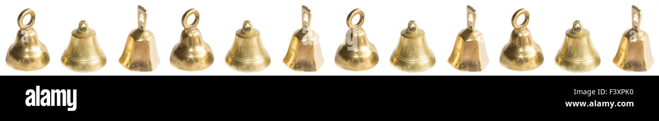 Brass bells in a row Stock Photo - Alamy