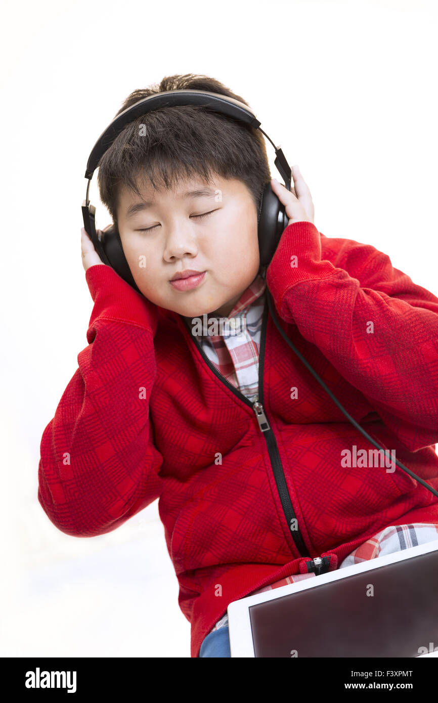 Boy listen to music hi-res stock photography and images - Alamy