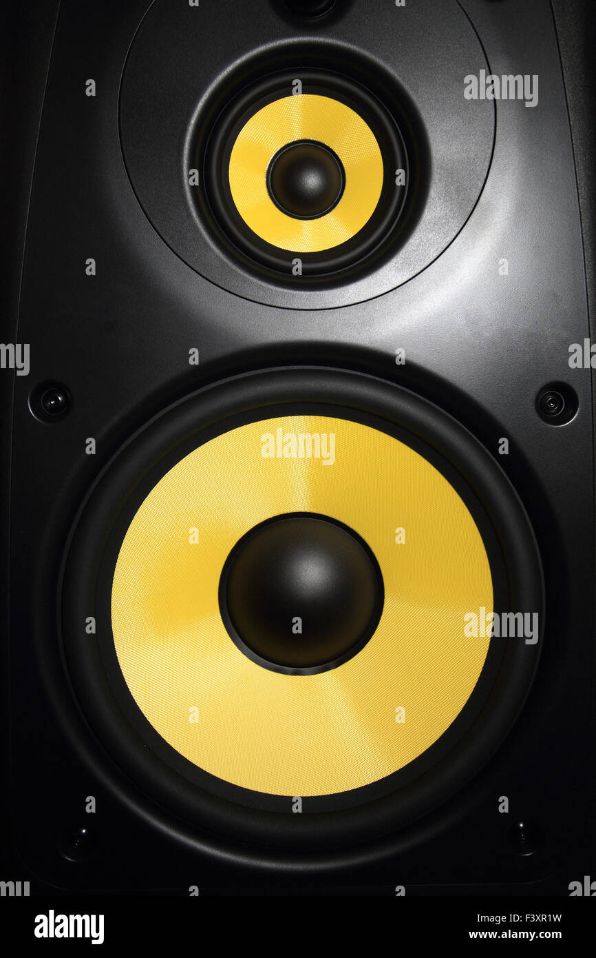 Closeup of a yellow speaker sub woofer Stock Photo - Alamy