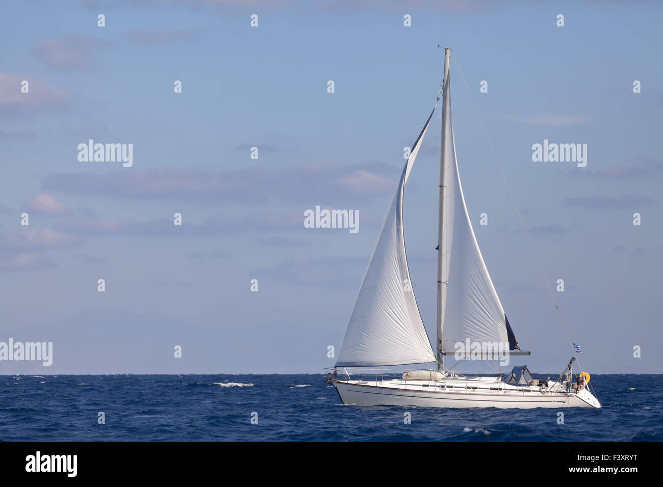 Sailing boat in blue sea Stock Photo - Alamy