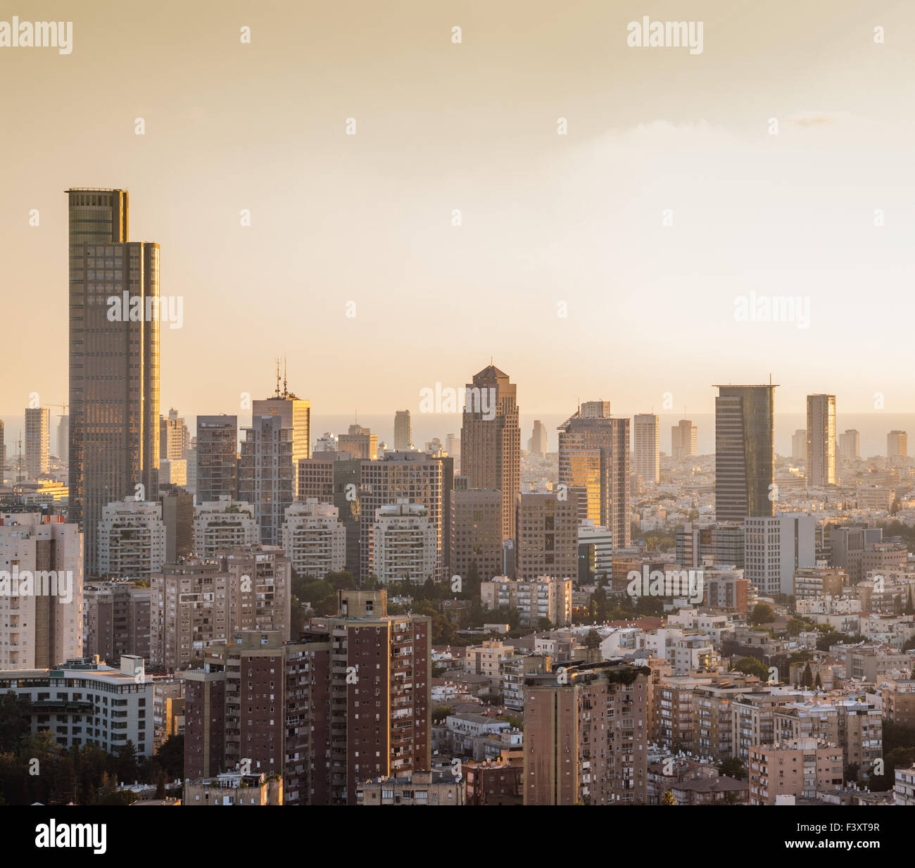 Cityscape at sunset Stock Photo - Alamy