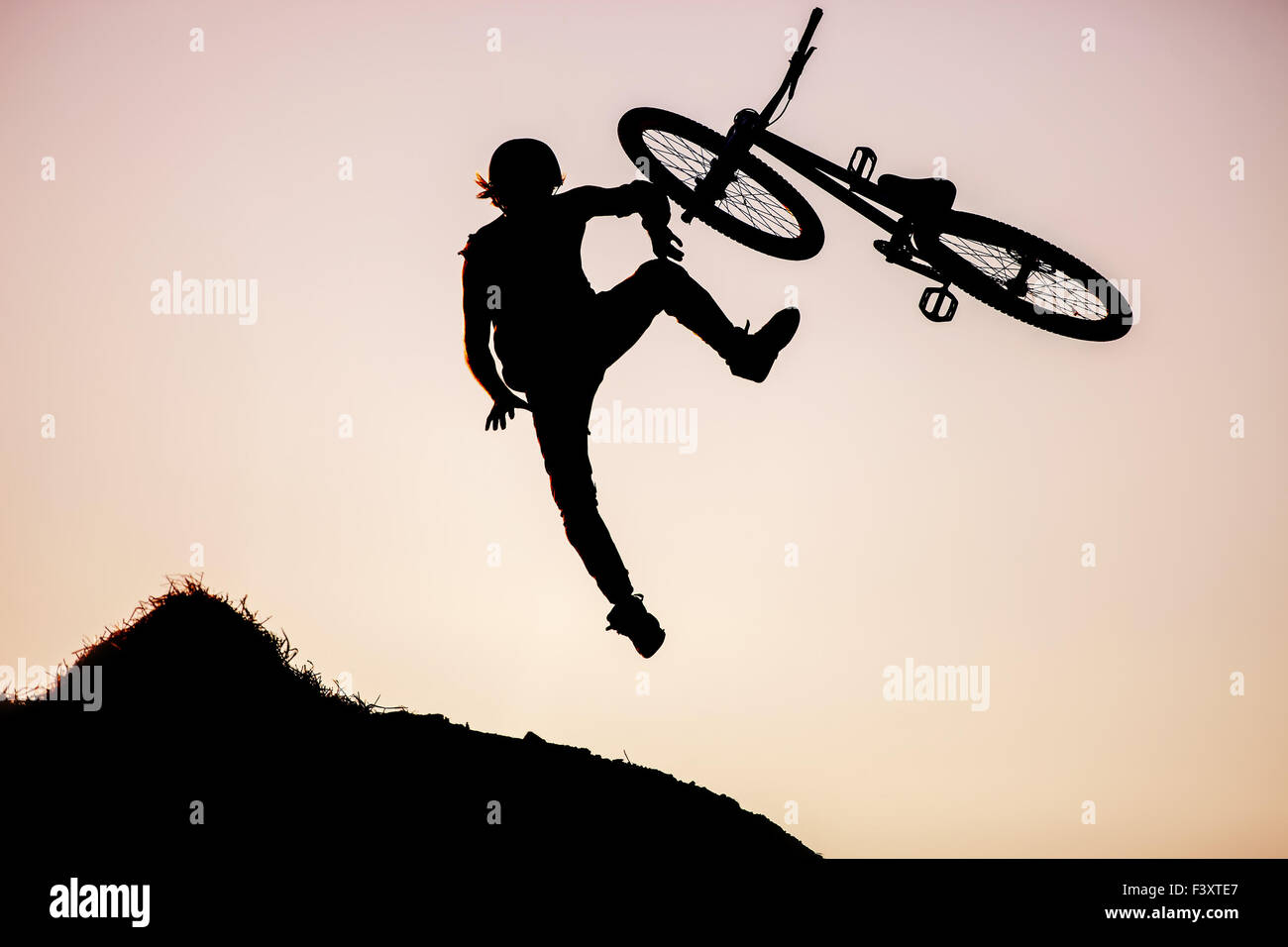 Extreme rider making a bike jump Stock Photo - Alamy