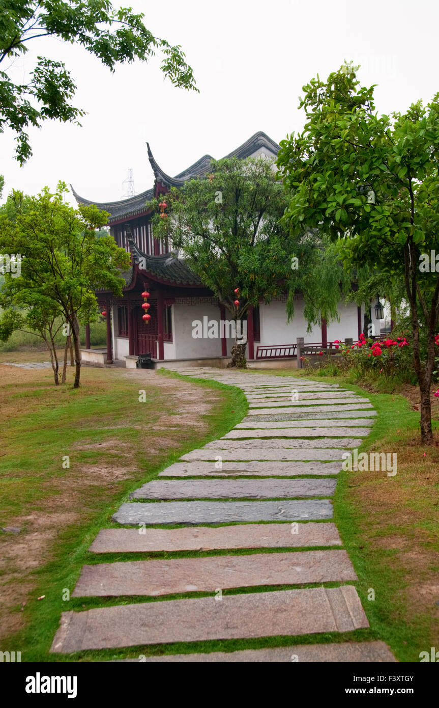 Path way to a Chinese pavilion and house Stock Photo - Alamy