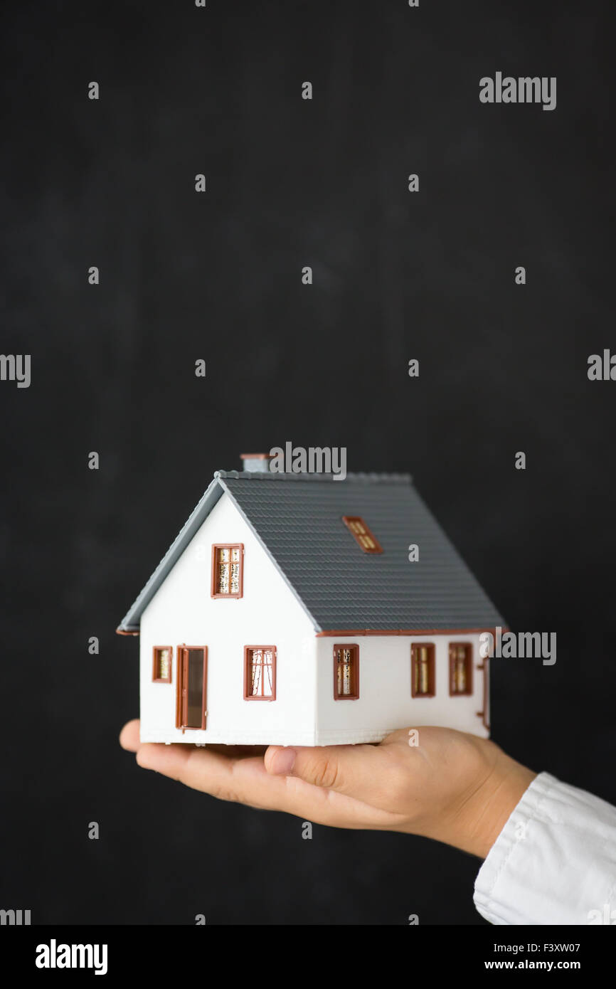 Child holding model house hi-res stock photography and images - Alamy