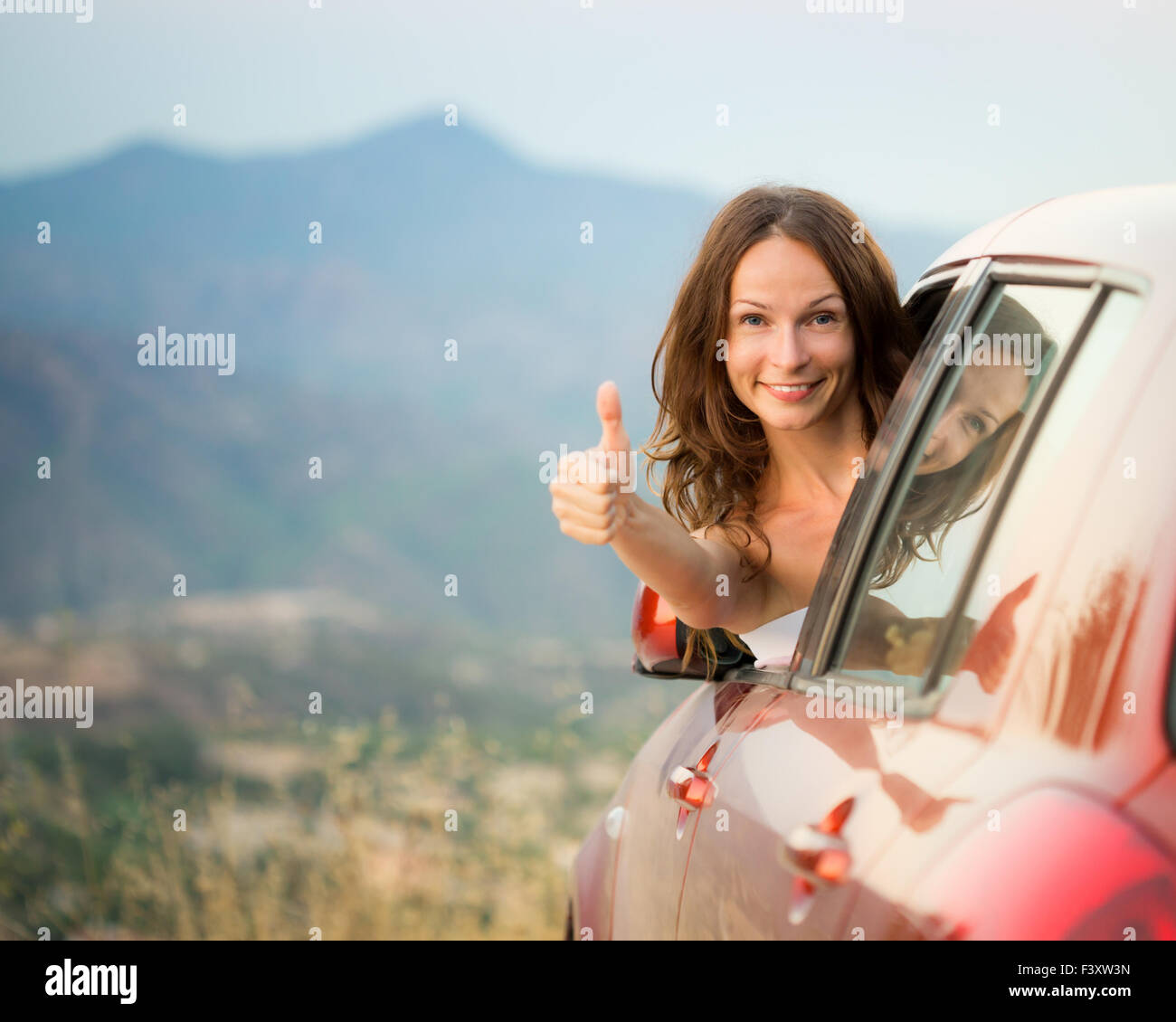 Happy driver woman on summer vacation Stock Photo - Alamy