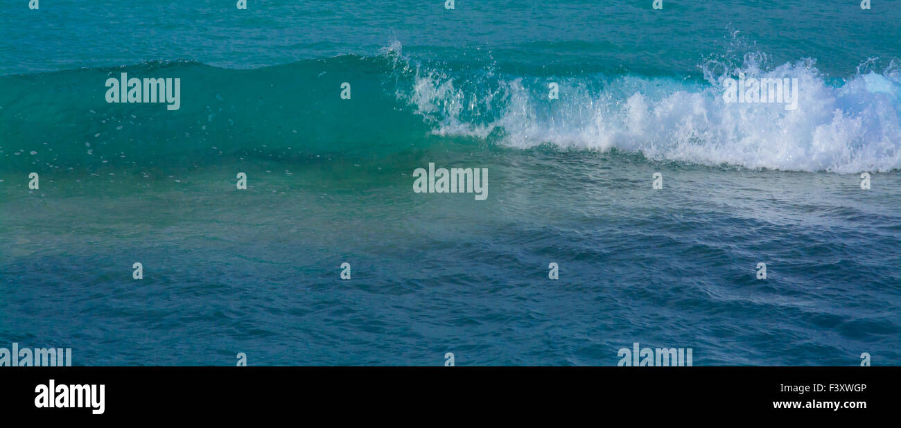 Wave with foam Stock Photo - Alamy