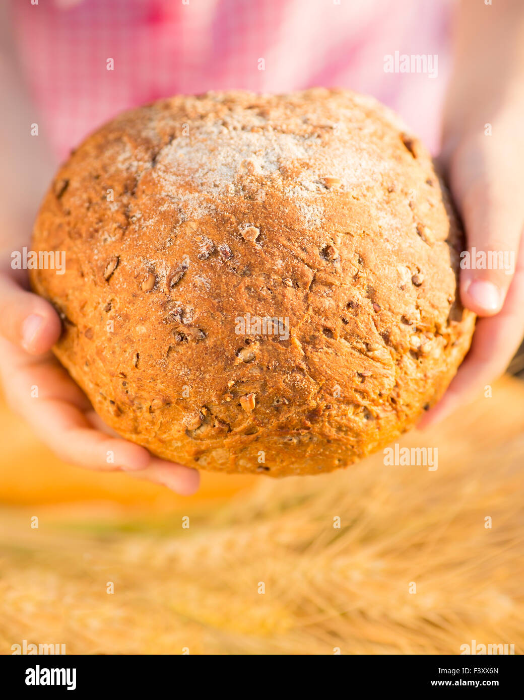 Child holding bread in hands Stock Photo - Alamy