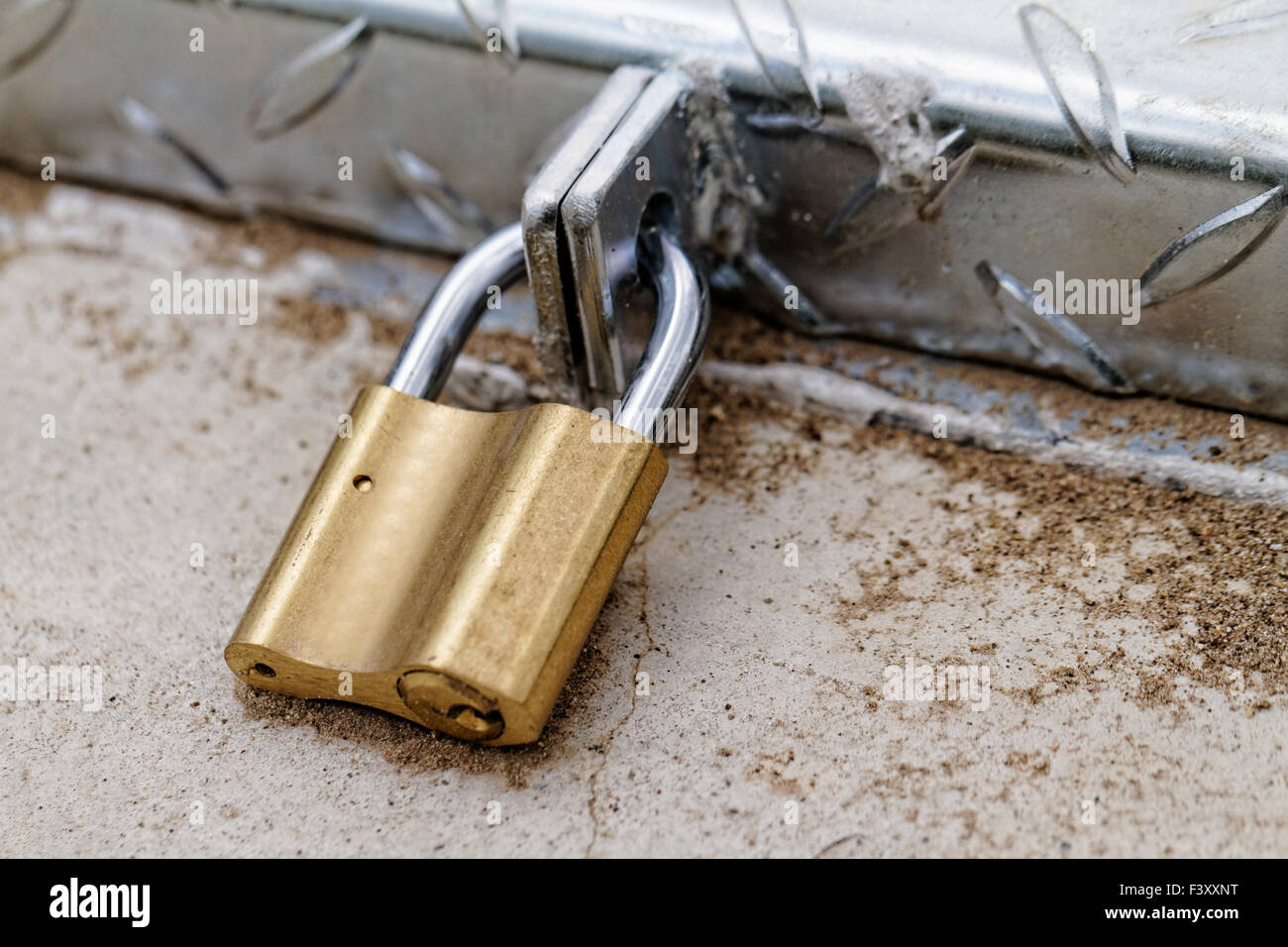 A padlock on an iron door - close-up Stock Photo - Alamy