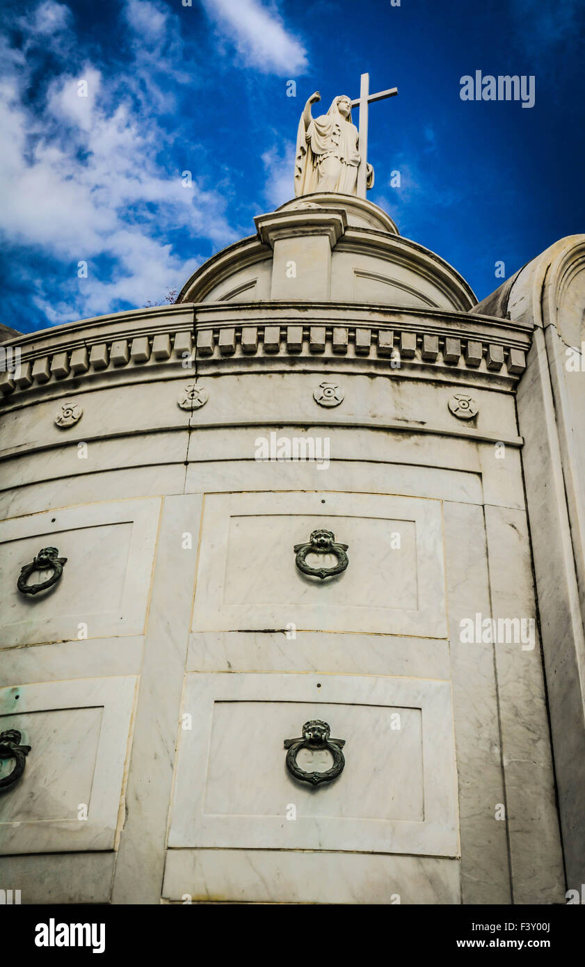 Angel with cross towers over the legendary crypts in the oldest and ...