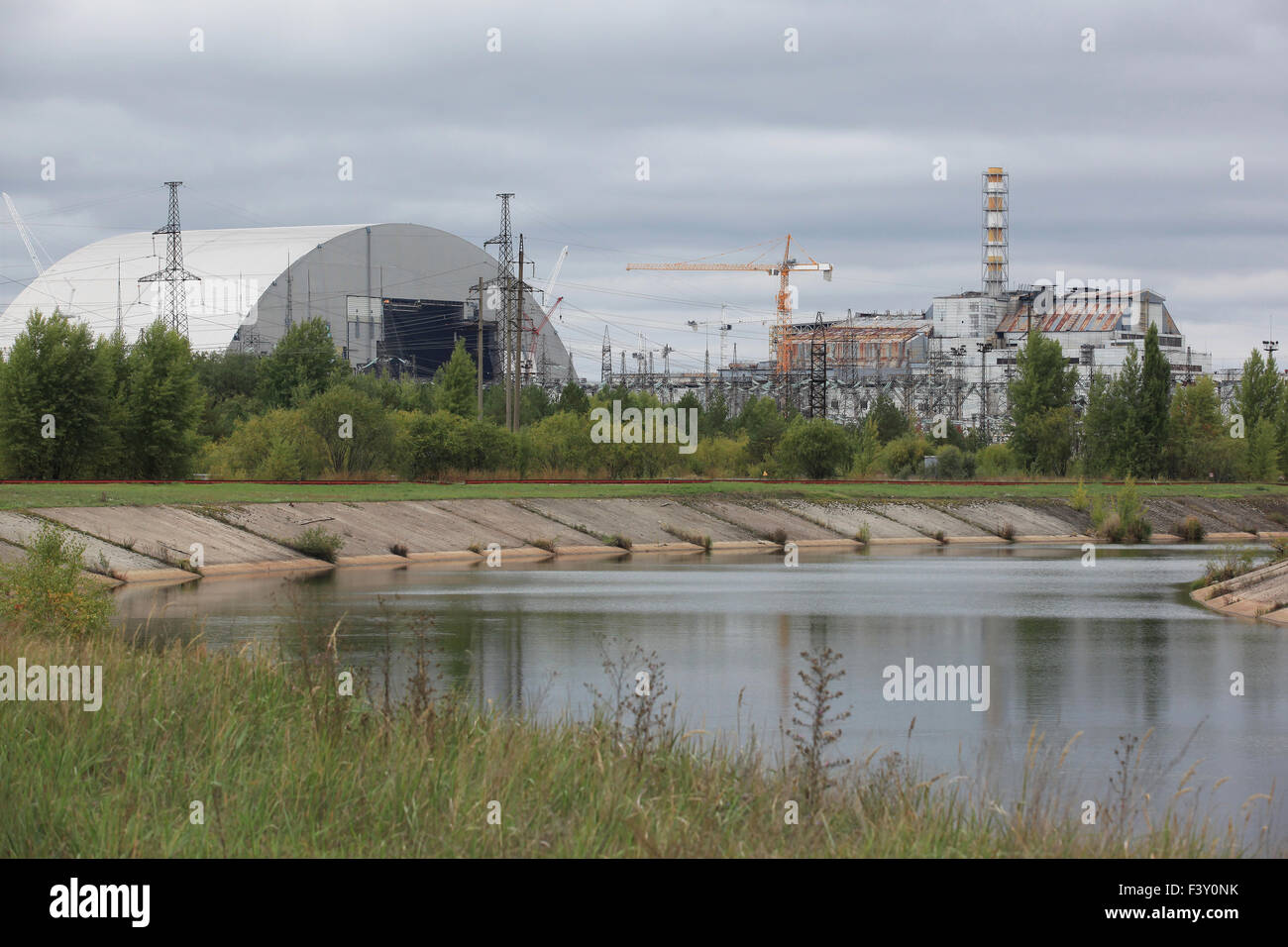 The Chernobyl nuclear power plant with the destroyed reactor no. 4 and ...