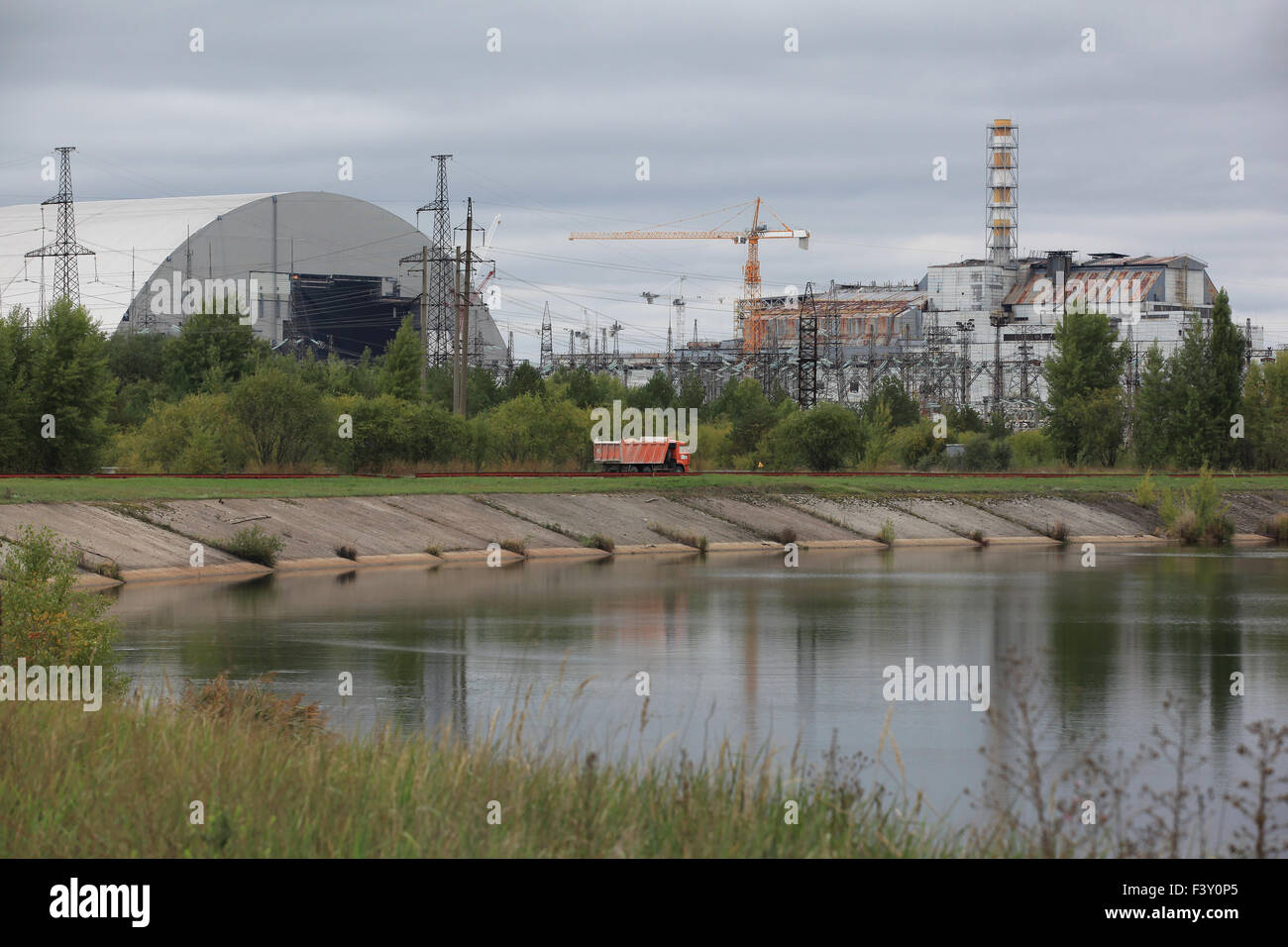 The Chernobyl nuclear power plant with the destroyed reactor no. 4 and ...