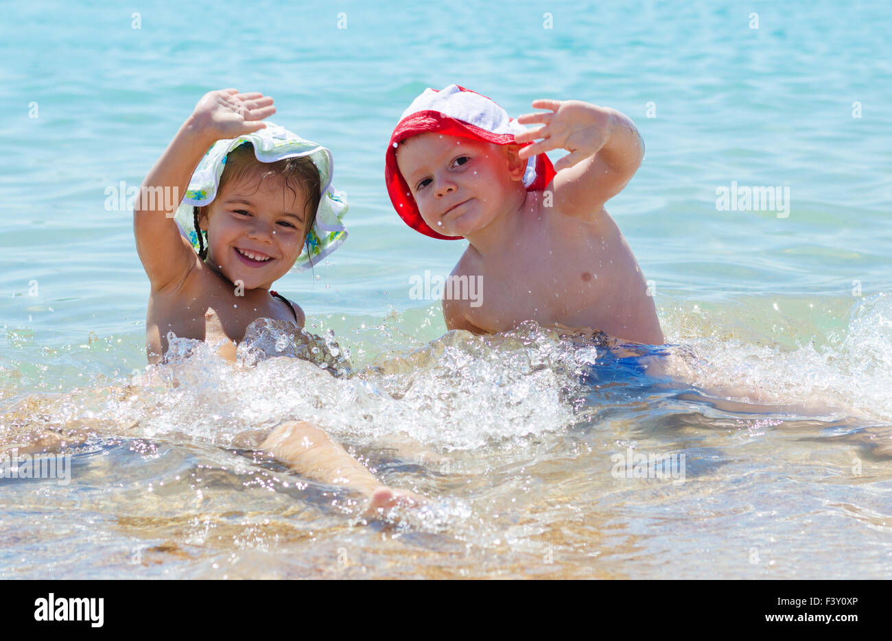 Playful children at the seaside hi-res stock photography and images - Alamy