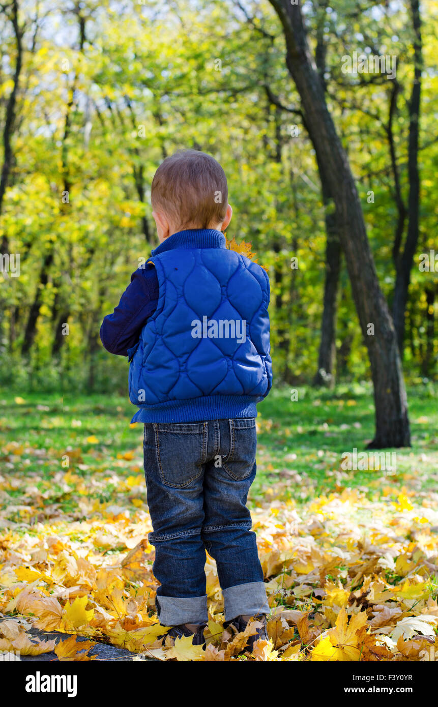 Small boy standing outside hi-res stock photography and images - Alamy