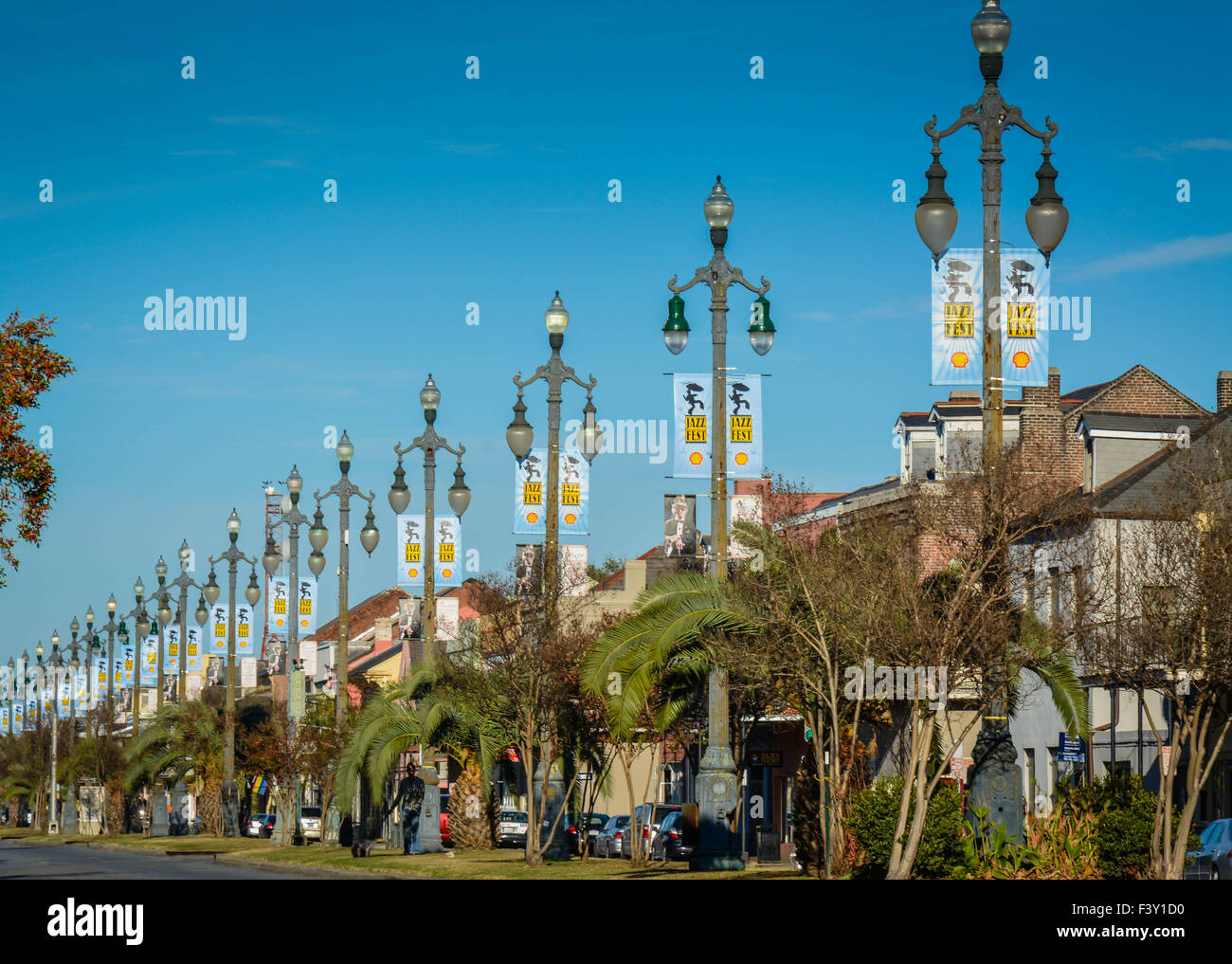 Repetitive pattern of antique lamp post line Rampart Street with Jazz ...