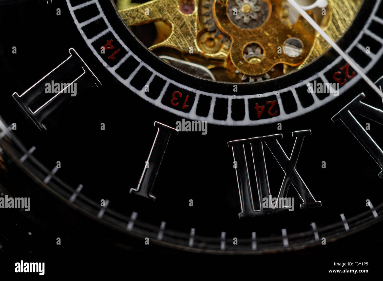 Old watch machine on dark background Stock Photo - Alamy