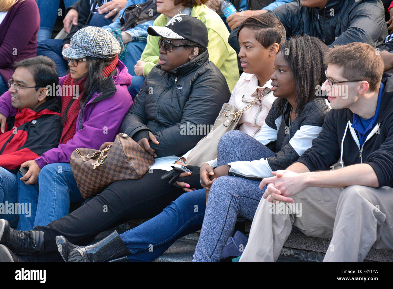 Group of women sitting in bleachers hi-res stock photography and images ...
