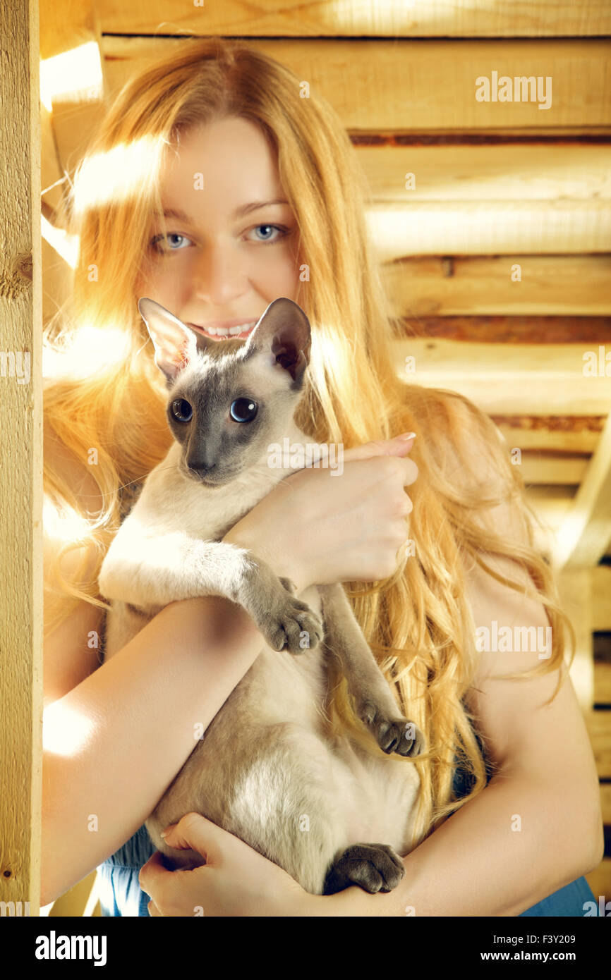 Girl With Cat Stock Photo - Alamy