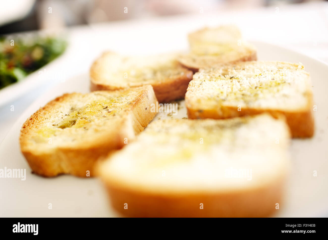Sliced bread on plate Stock Photo - Alamy