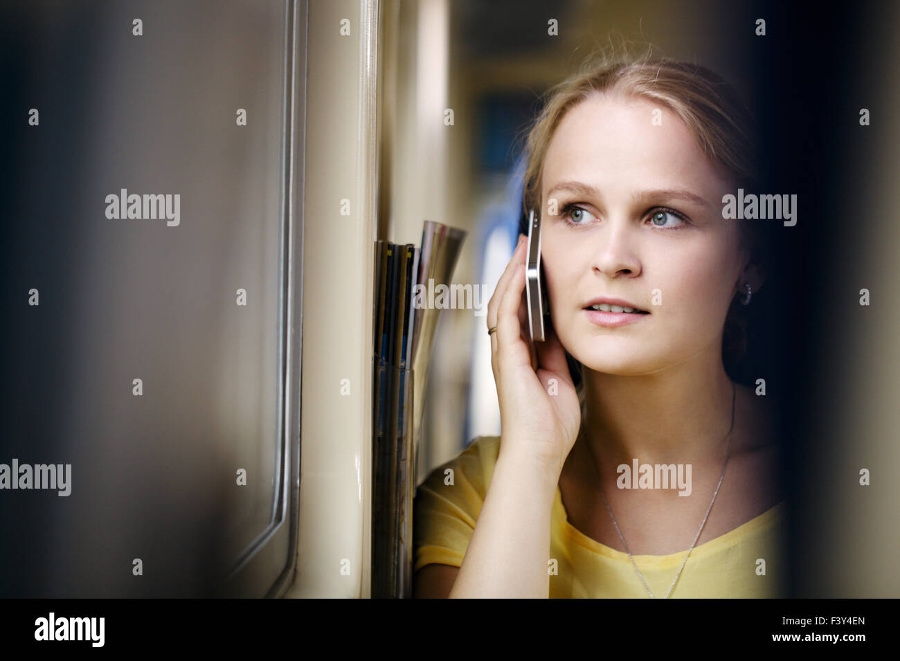 Woman talking on the phone Stock Photo - Alamy