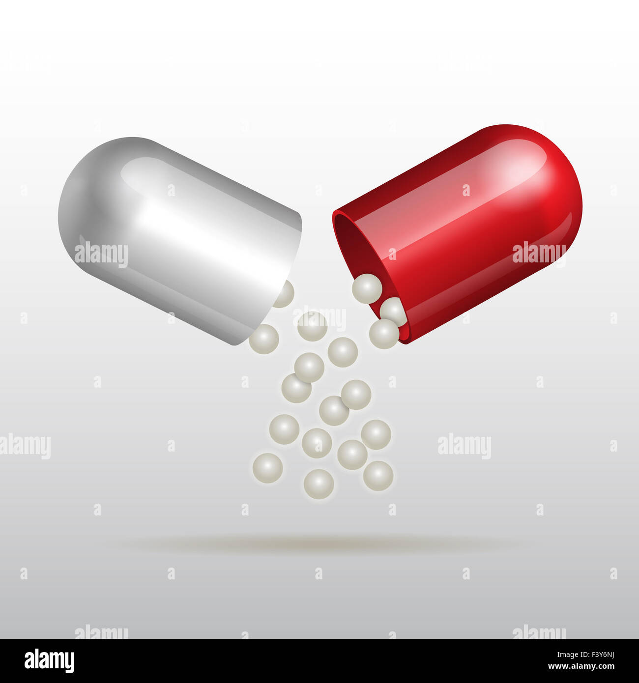 Opening red medical capsule Stock Photo - Alamy
