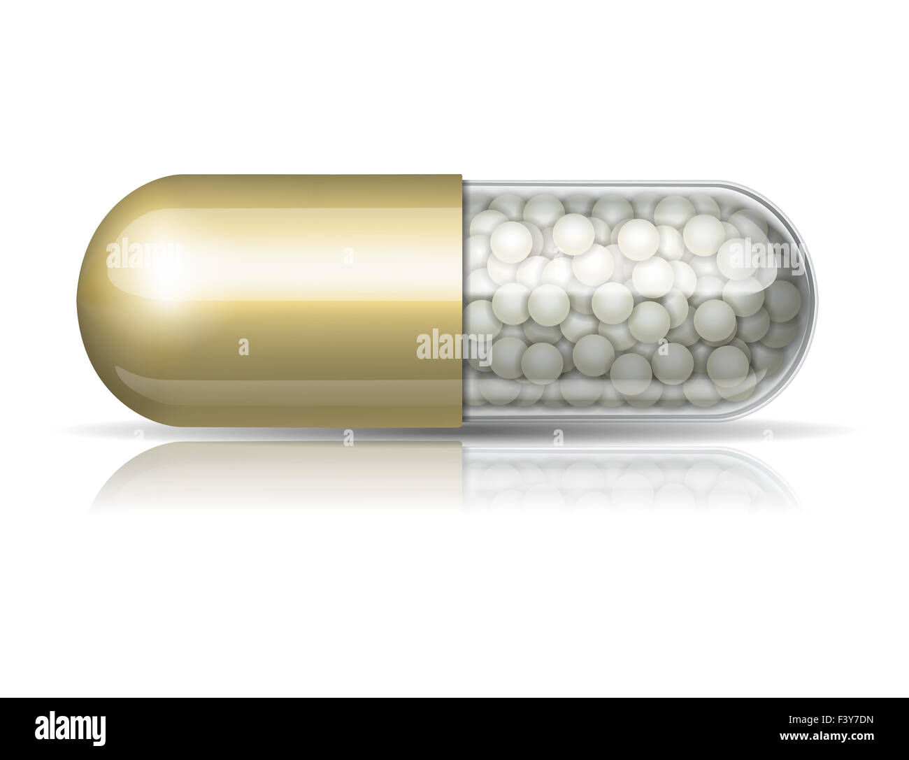 Medical golden capsule with granules Stock Photo - Alamy