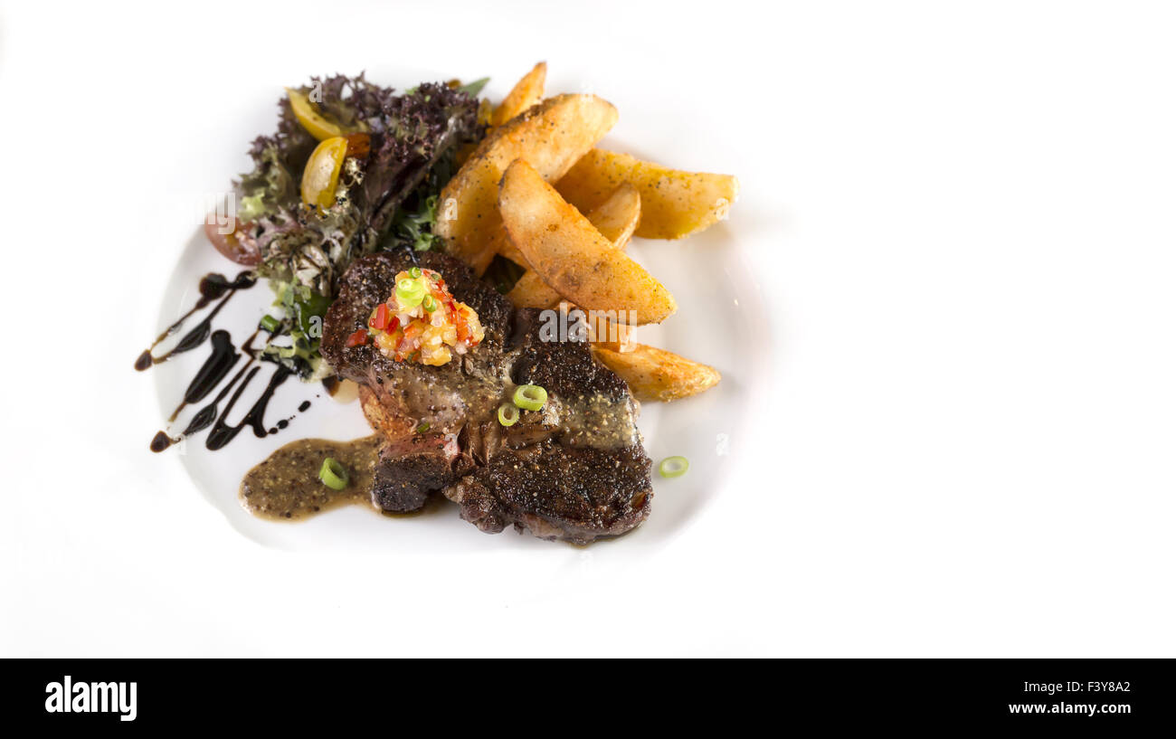 Beef steak roasted vegetables Cut Out Stock Images & Pictures - Alamy