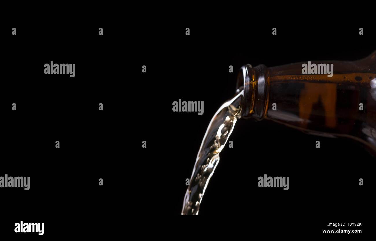 Pouring beer glass from bottle hi-res stock photography and images - Alamy