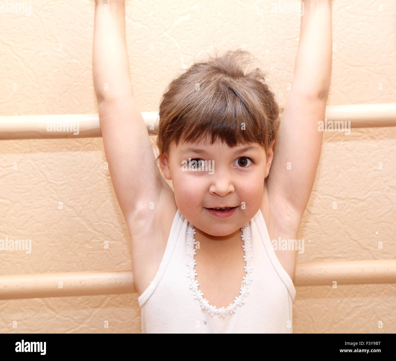 Child gymnastics bar hi-res stock photography and images - Alamy